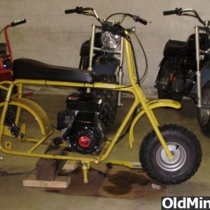 Yellow DB30 on rack | OldMiniBikes.com