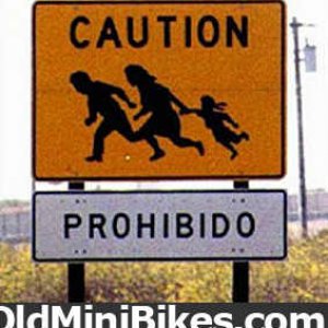 immigrant-crossing-sign | OldMiniBikes.com