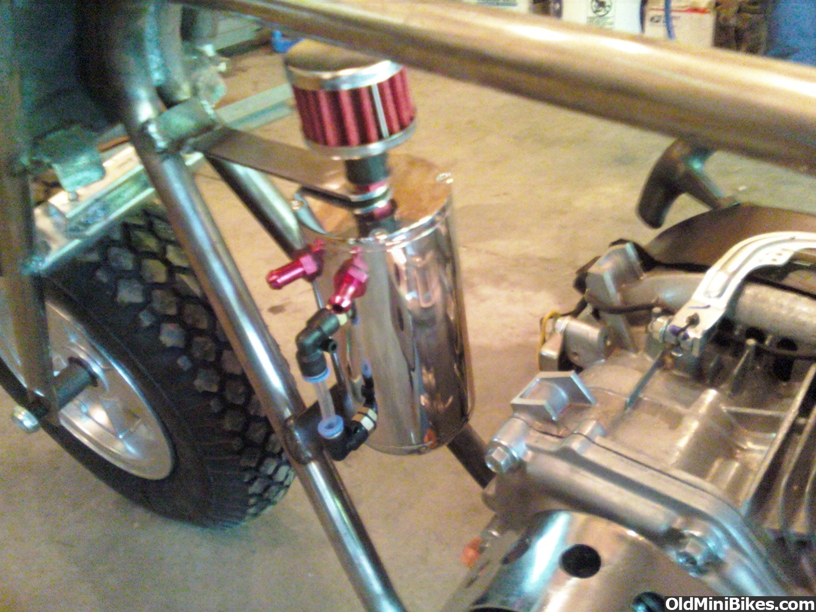 Oil catch can and breather mount install | OldMiniBikes.com